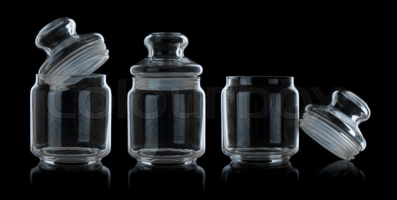 Empty glass jar on a black background | Stock image | Colourbox