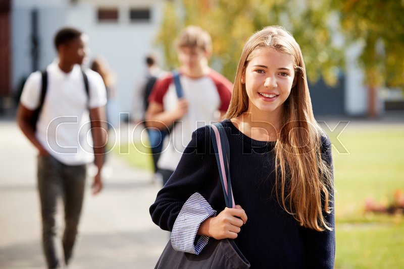 Portrait Of Female Teenage Student On ... | Stock image | Colourbox
