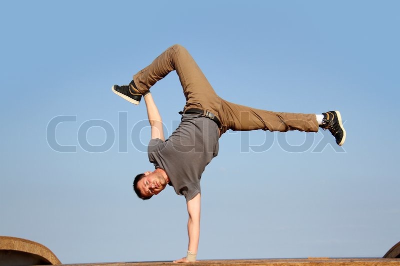 Male breakdancer on natural background | Stock image | Colourbox