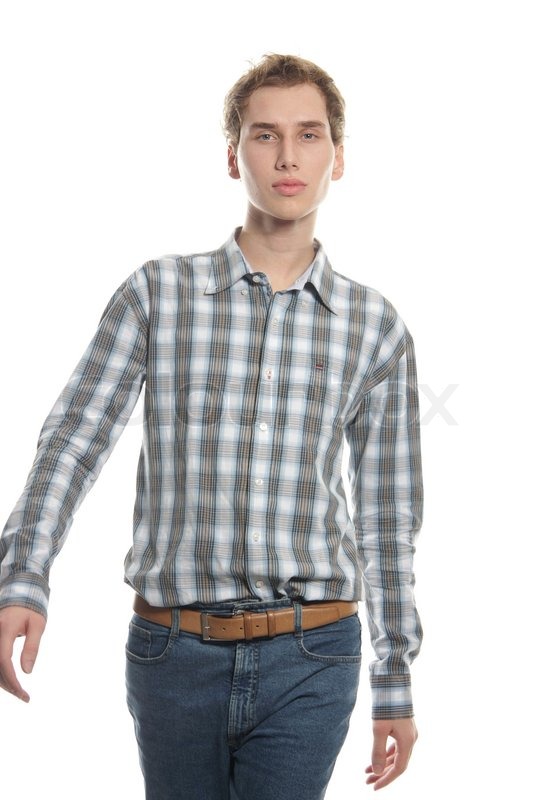 Studio shot of walking young man over white | Stock Photo | Colourbox