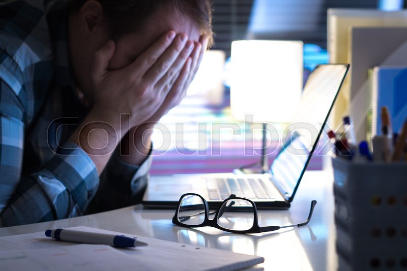 Problems at work. Sad, unhappy and ... | Stock image | Colourbox