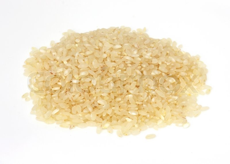 PILE af brune ris isoleret på hvid ... | Stock foto | Colourbox