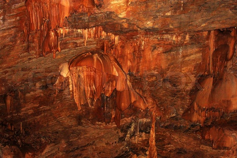 Stalactites and stalagmites in a cave | Stock image | Colourbox