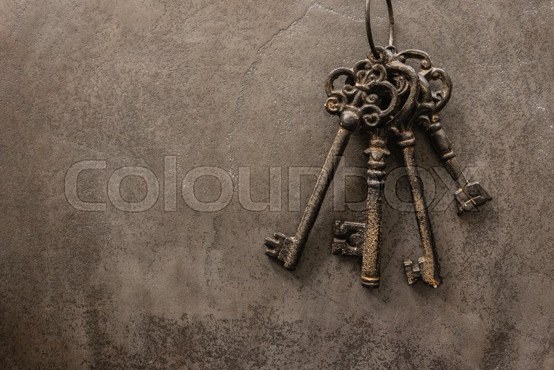 Antique keys on old steel metal texture ... | Stock image | Colourbox
