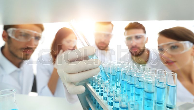 Group of microbiologists studying the ... | Stock image | Colourbox