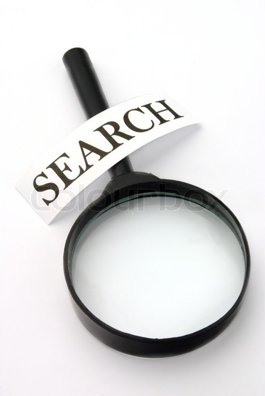 Magnifier and piece of paper with an ... | Stock Photo | Colourbox