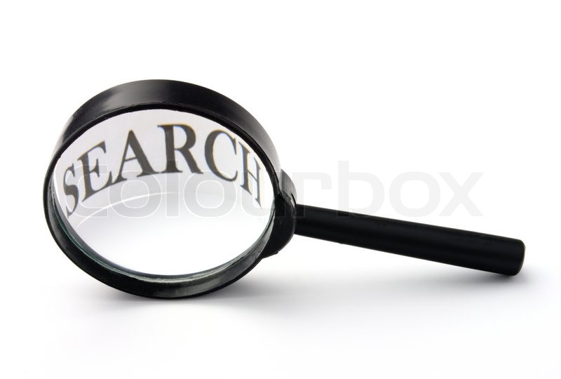 Magnifier and piece of paper with an ... | Stock Photo | Colourbox