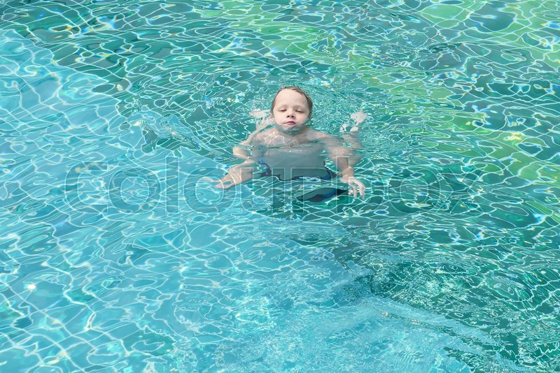 Cute little boy in the swimming pool | Stock image | Colourbox
