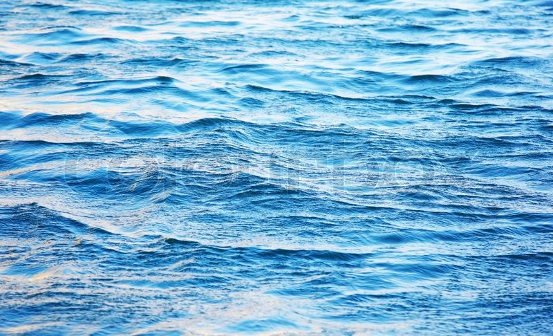 Blue water background with wavy pattern | Stock image | Colourbox