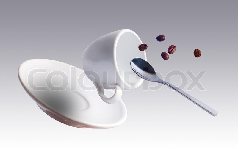 Falling coffee cup with spoon, saucer ... | Stock image | Colourbox