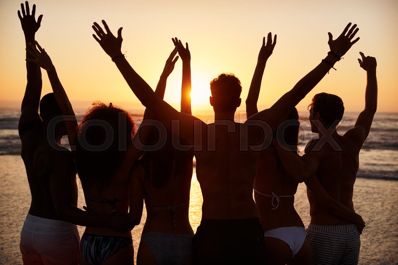 Silhouette Of Friends On Beach Vacation ... | Stock image | Colourbox