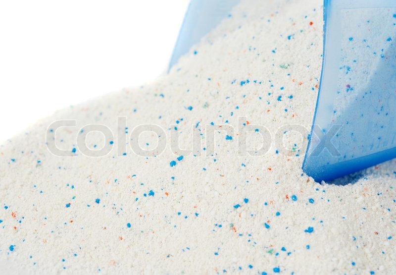 Washing powder in a measuring cup on a ... | Stock image | Colourbox