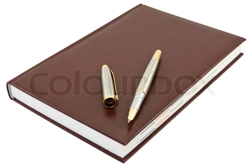 Ink pen and book isolated on white ... | Stock image | Colourbox