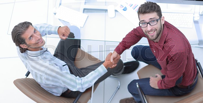 View from the top.the handshake of the ... | Stock image | Colourbox