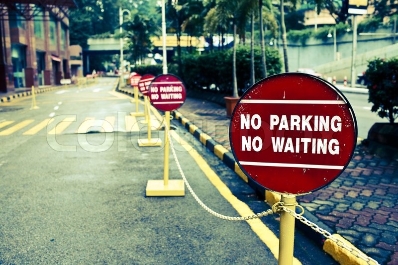 Row of No Parking signs on the street | Stock image | Colourbox