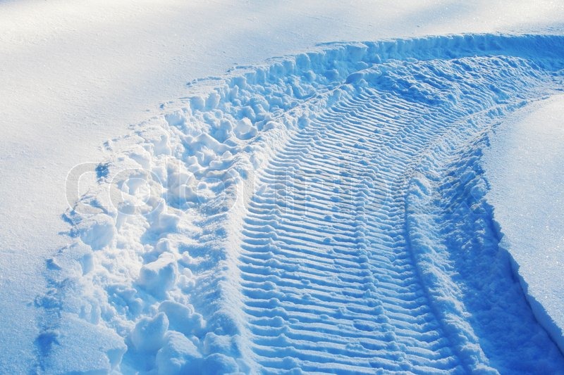 Snowmobile track on snow | Stock Photo | Colourbox