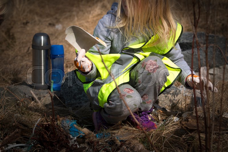 Children are picking up plastic litter | Stock image | Colourbox