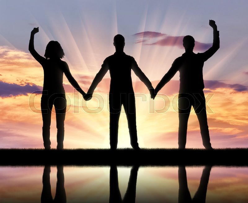 Group Holding Hands Sunset
