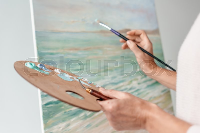 Artist Holding Paint Palette