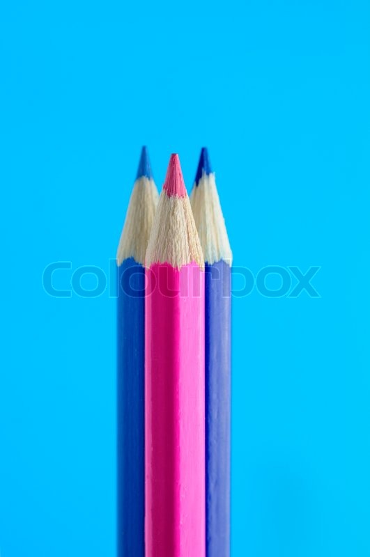 Blue and Pink Pencils on Light Blue ... | Stock image | Colourbox