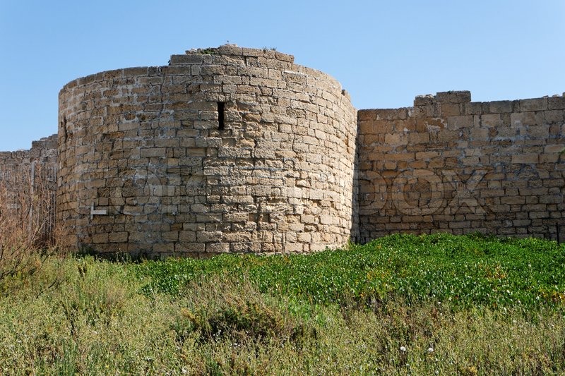Round tower and wall of medieval castle ... | Stock image | Colourbox
