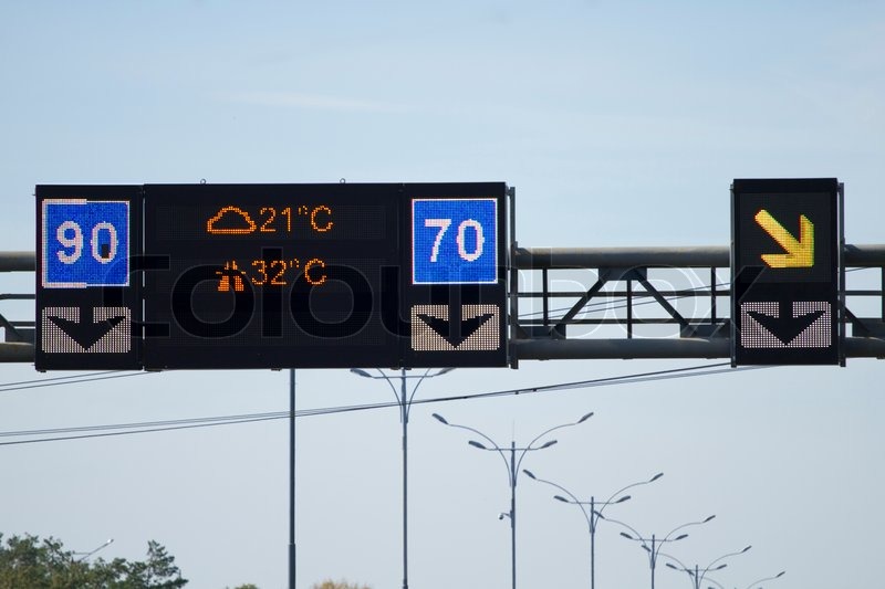 Electronic road sign on blue sky | Stock image | Colourbox