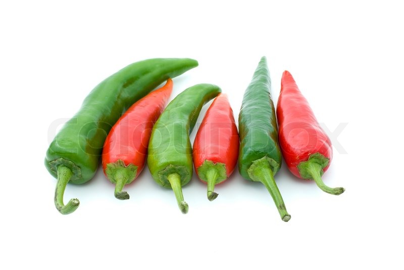 Einige rote und grüne Peperoni auf dem ... | Stock Bild | Colourbox