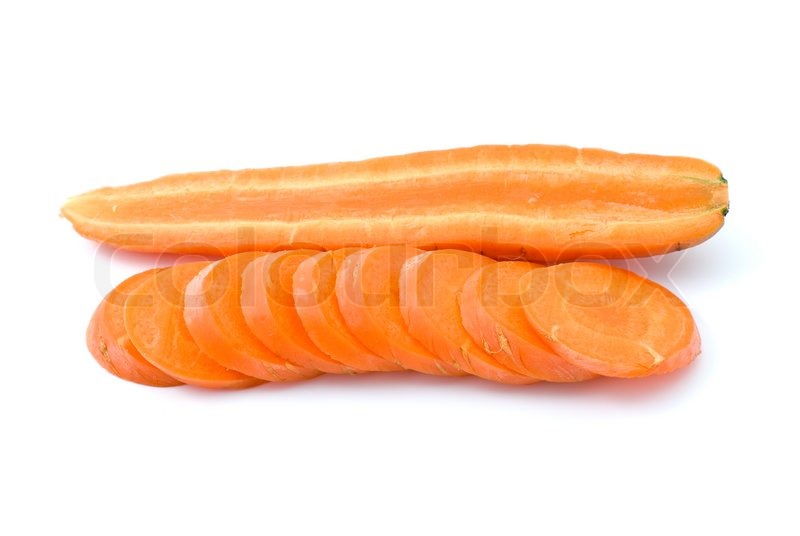 Half of ripe fresh long carrot and some ... | Stock image | Colourbox