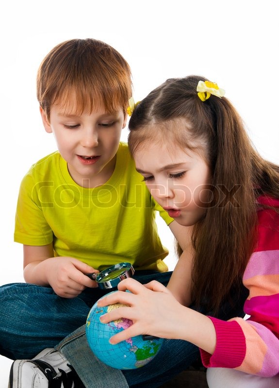 Kids with a globe of the world over ... | Stock image | Colourbox