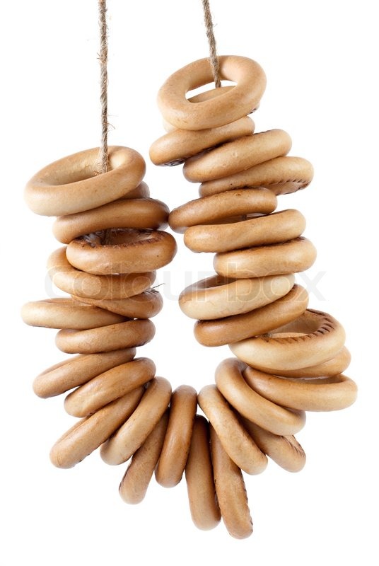 Some bread-rings hanging on rope ... | Stock image | Colourbox
