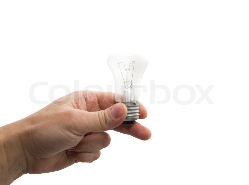 Light bulb in hand isolated on a white ... | Stock image | Colourbox
