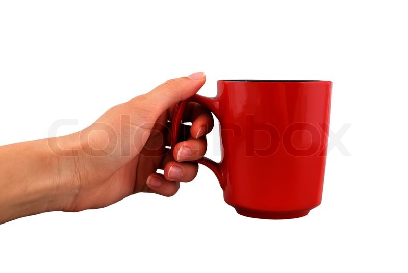 Red cup in hand on white background | Stock image | Colourbox