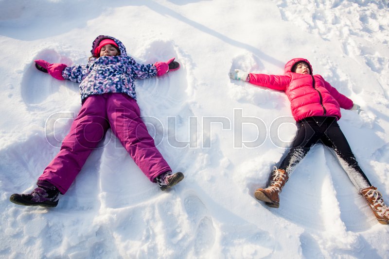 Kids Making Snow Angels