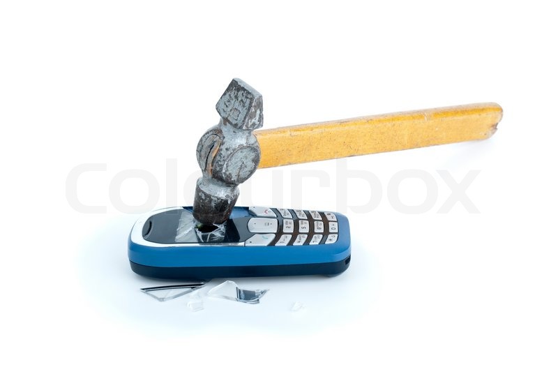 Hammer smashing Mobiltelefon auf dem ... | Stock Bild | Colourbox