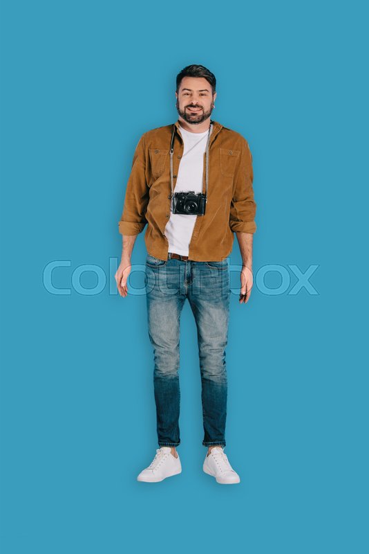 Top view of stylish male photographer ... | Stock image | Colourbox