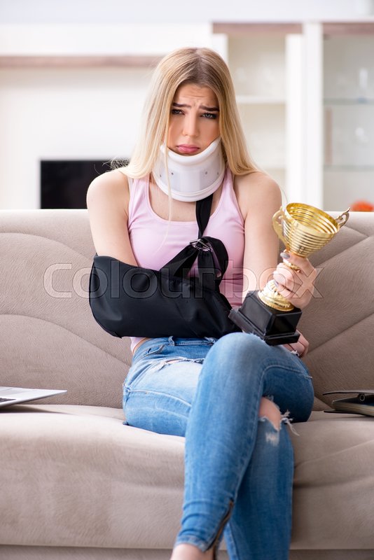 Woman injured during sport game | Stock image | Colourbox