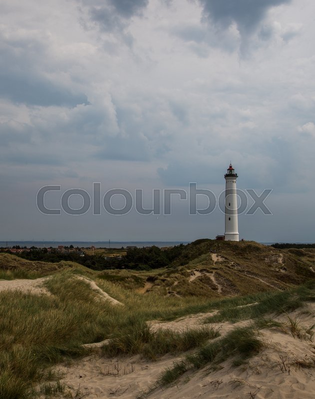 Fyrtårn og klitter ved vestkysten, ... | Stock foto | Colourbox