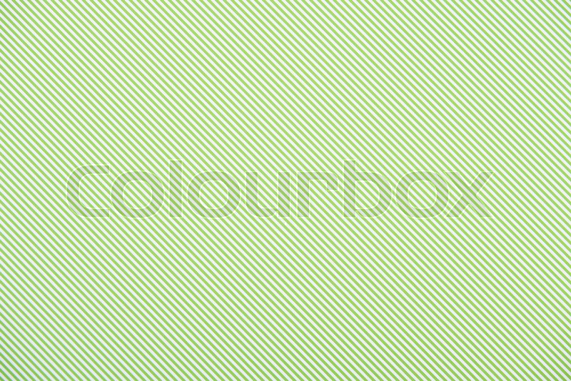 Striped diagonal green and white ... | Stock image | Colourbox