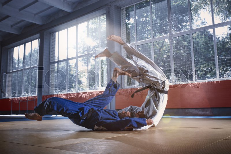 Two judo fighters showing technical ... | Stock image | Colourbox