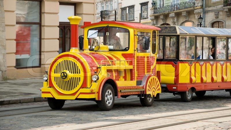 Yellow red excursion train with wagon ... | Stock image | Colourbox