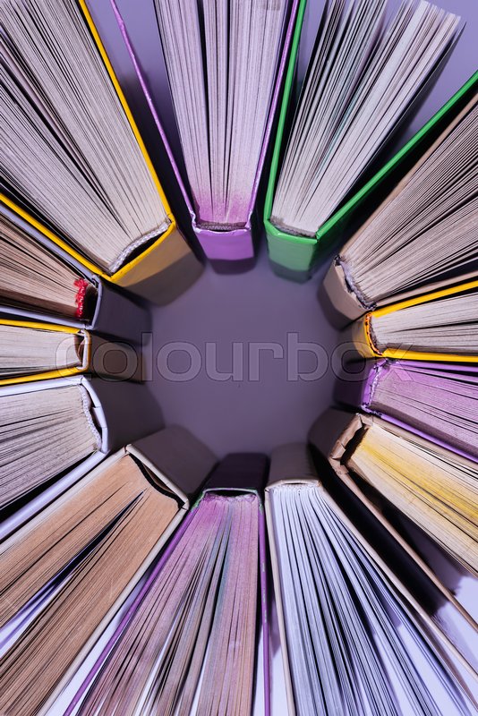 Top view of stack of colored books in ... | Stock image | Colourbox