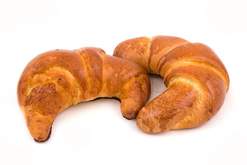 Two croissant isolated on a white | Stock image | Colourbox