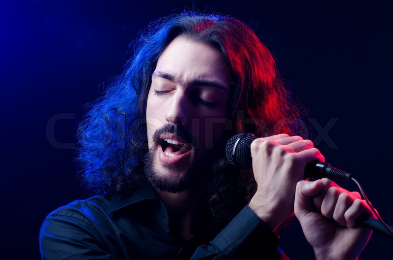 Man singing at the concert | Stock image | Colourbox