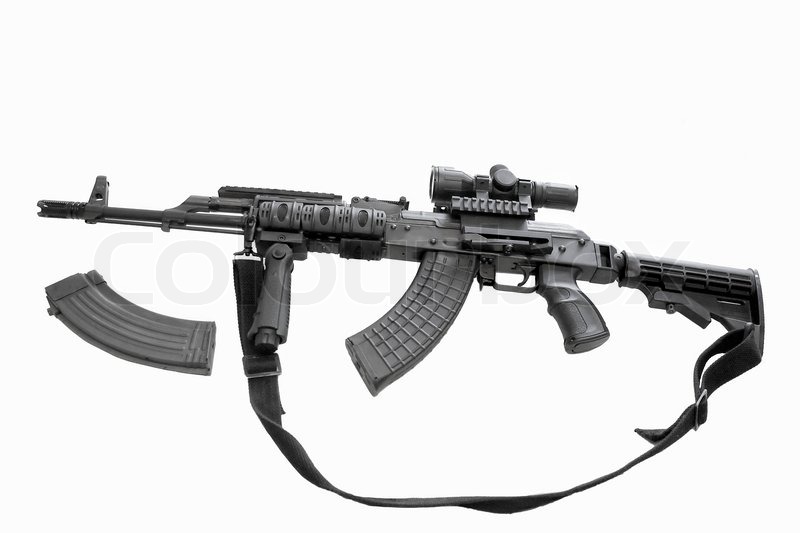 AK-47 assault rifle on a white back ... | Stock image | Colourbox