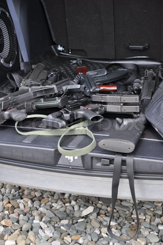 Car baggage space full of the weapons | Stock Photo | Colourbox