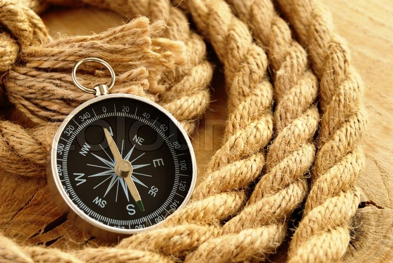 Black compass and marine rope | Stock image | Colourbox
