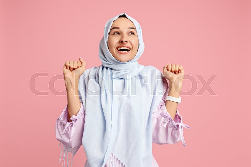 Happy arab woman in hijab. Portrait of ... | Stock image | Colourbox