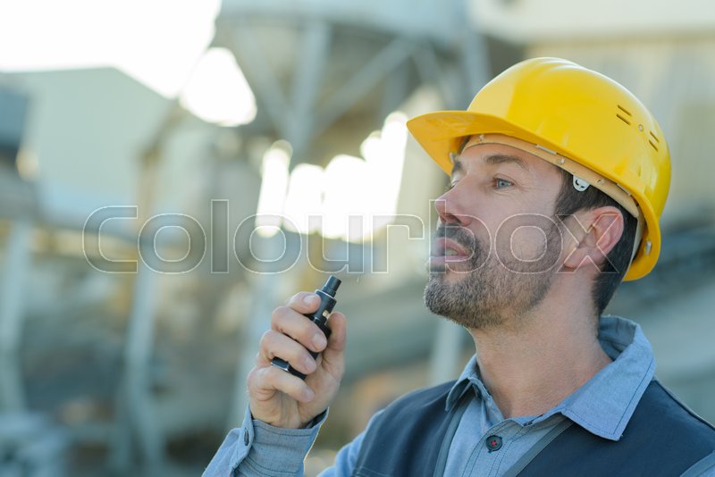 Builder smoking cigarette on ... | Stock image | Colourbox
