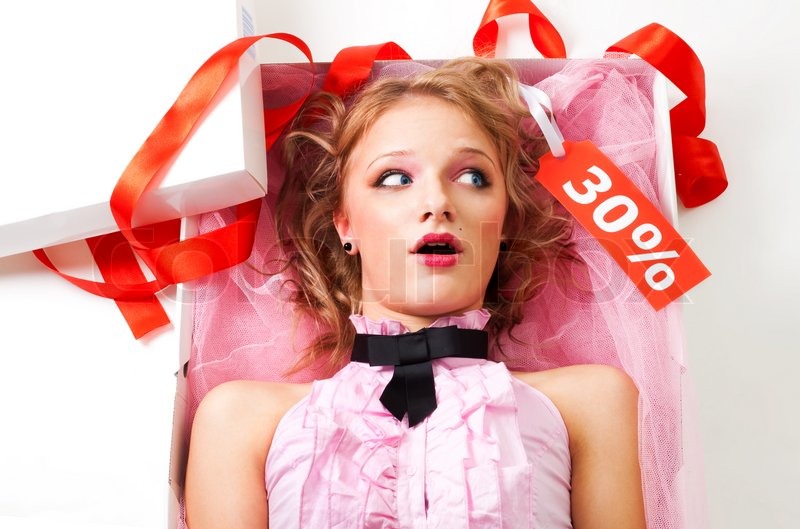 Doll in present box, shocked at the ... | Stock image | Colourbox