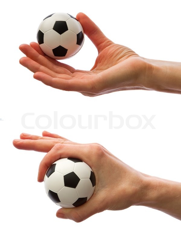 Soccer ball in hand | Stock image | Colourbox